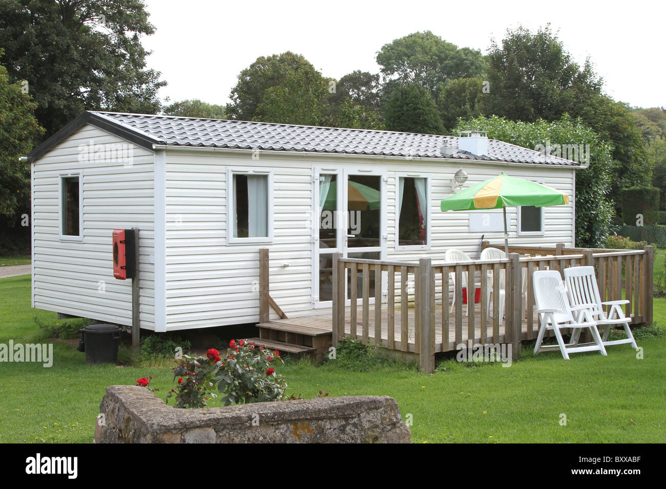 Static holiday home caravan on a woodland caravan park campground Stock ...