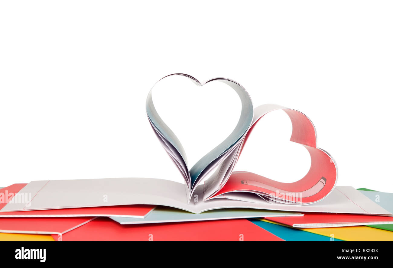 Book with opened pages and shape of heart Stock Photo - Alamy