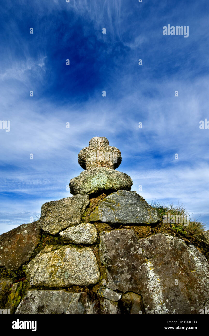The cross on a wall of St Helens Oratory at Cape Cornwall. Photograph ...