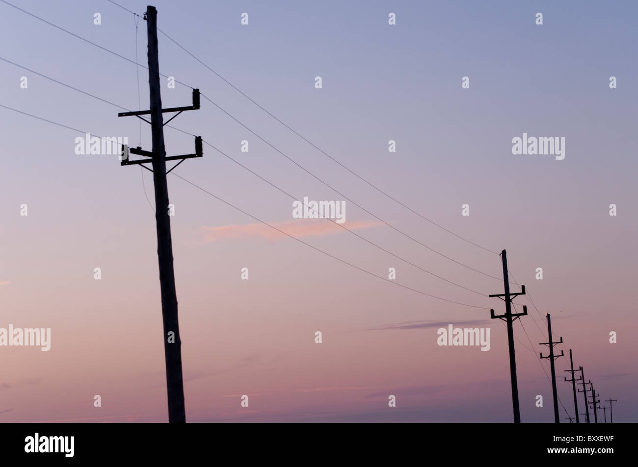 Poles at sunset Stock Photo - Alamy