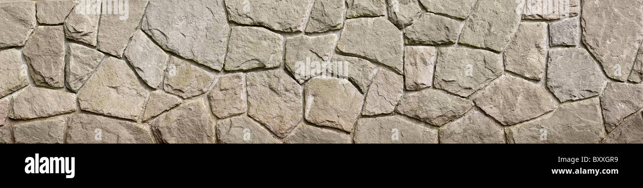 Panoramic of a large stone and rock wall Stock Photo - Alamy