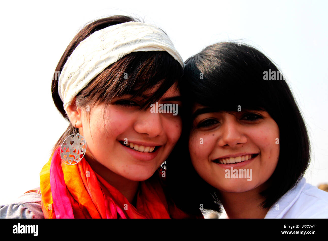 Two Indian girls smiling Stock Photo - Alamy