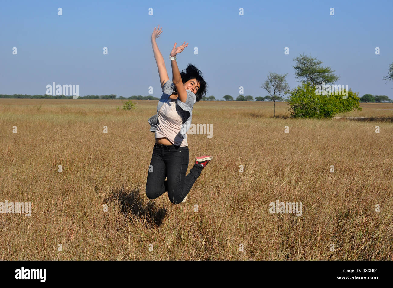 Jumping indian girl hi-res stock photography and images - Alamy