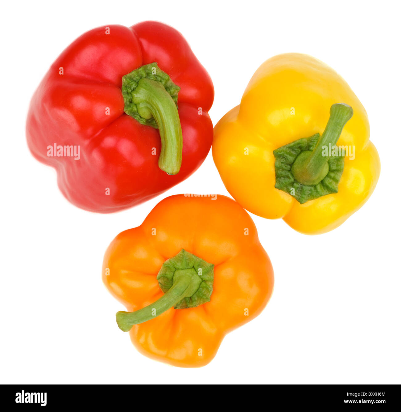 Red Yellow and orange capsicum peppers Stock Photo - Alamy