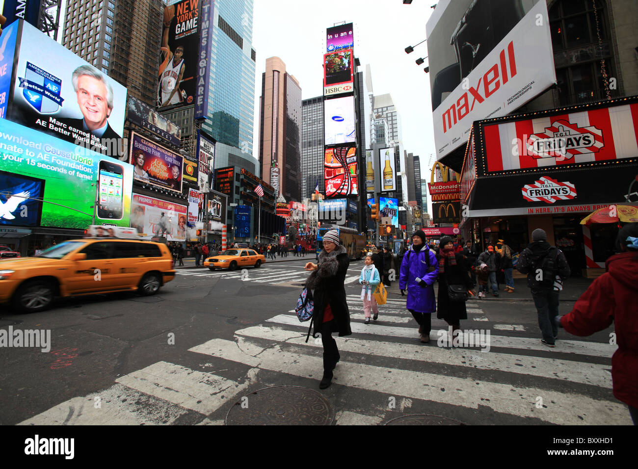 Pedestrians crossing a busy intersection in Times Square in 2010 ...