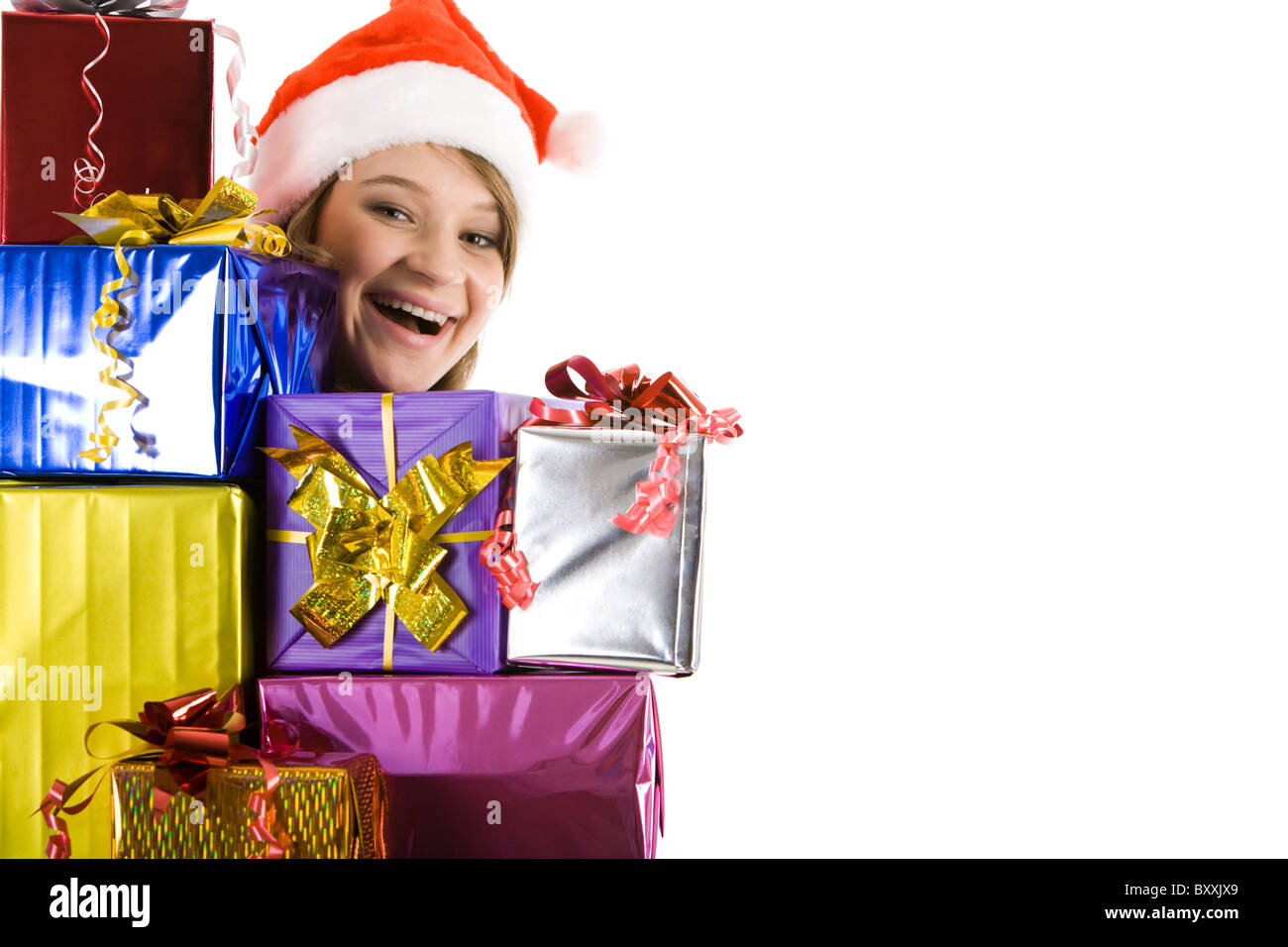 Photo of happy face of girl over color boxes Stock Photo - Alamy