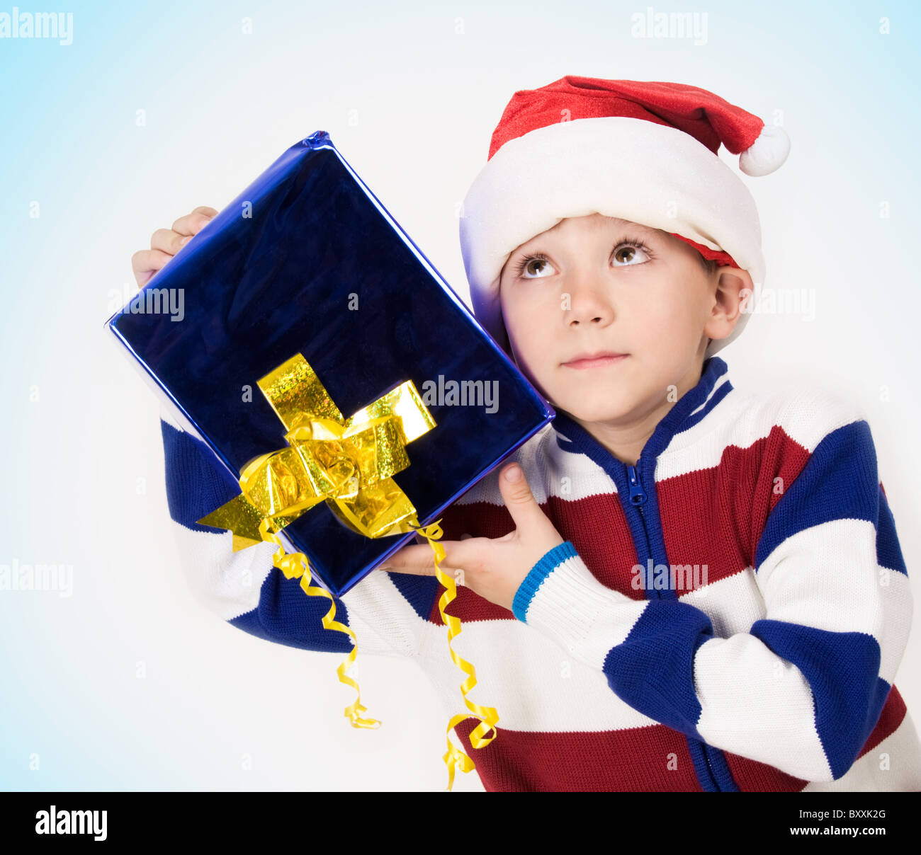 Boy holding something in hands hi-res stock photography and images - Alamy