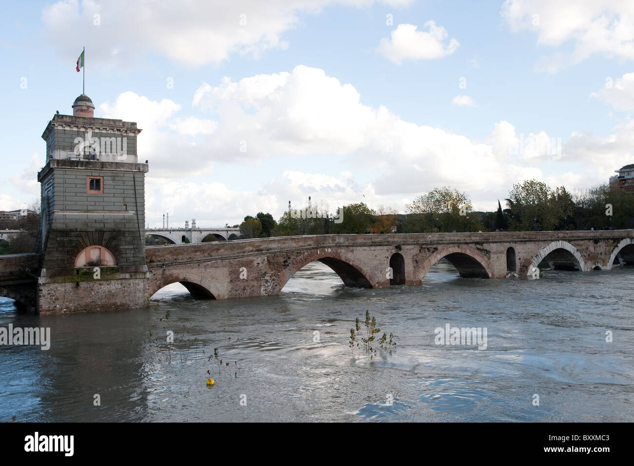 Tiber river full high water in Ponte Milvio bridge raining Rome Italy ...