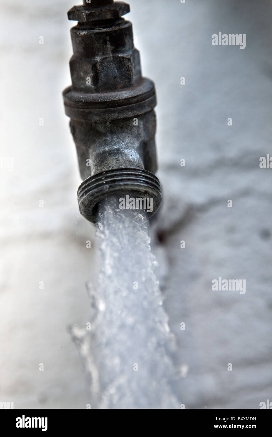 Running Garden Tap Stock Photo - Alamy