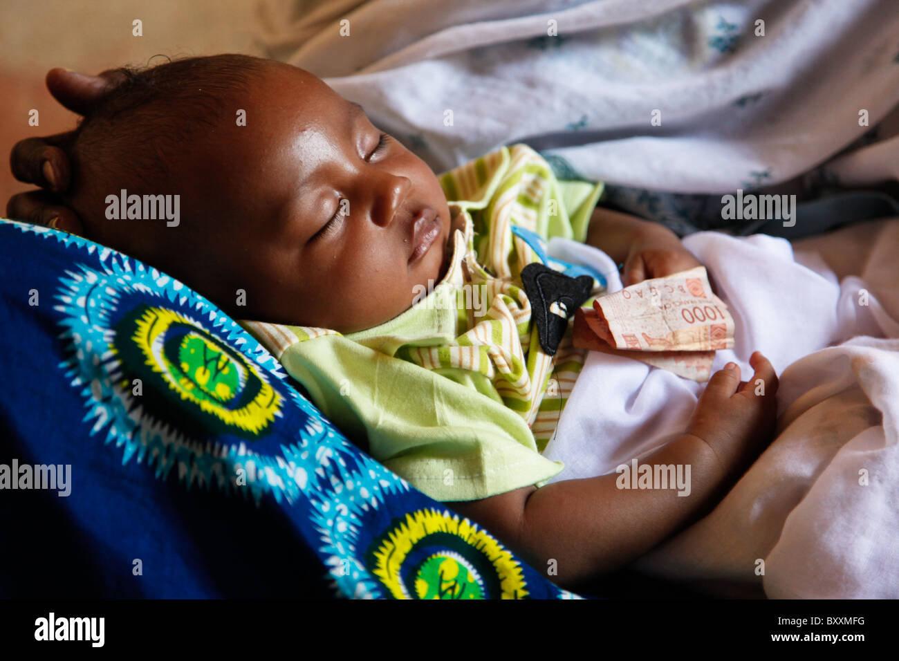 Baby baptism african hi-res stock photography and images - Alamy