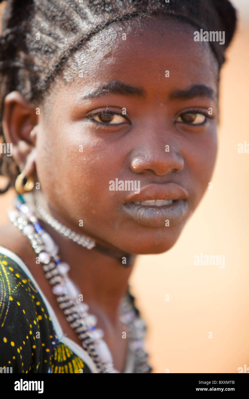 Portrait of a young Fulani woman in the town of Djibo in northern ...