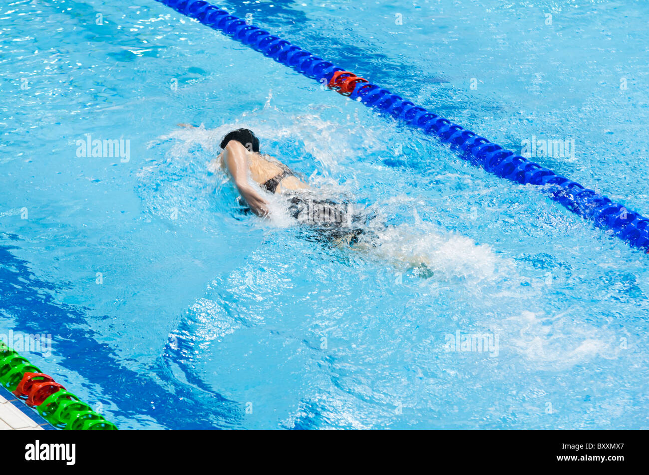 swimmer swimming in a pool Stock Photo - Alamy