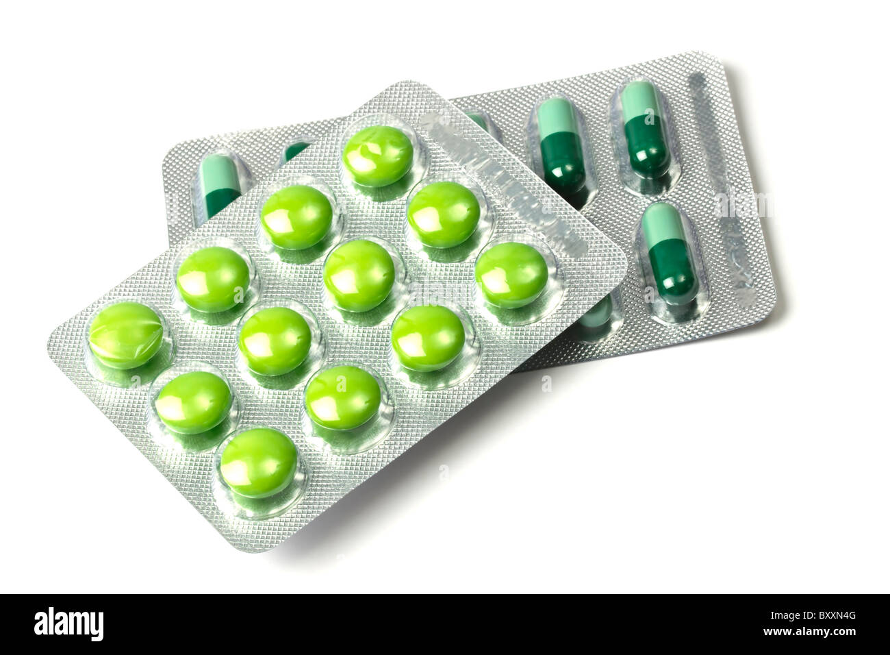 Green and white capsules hi-res stock photography and images - Alamy
