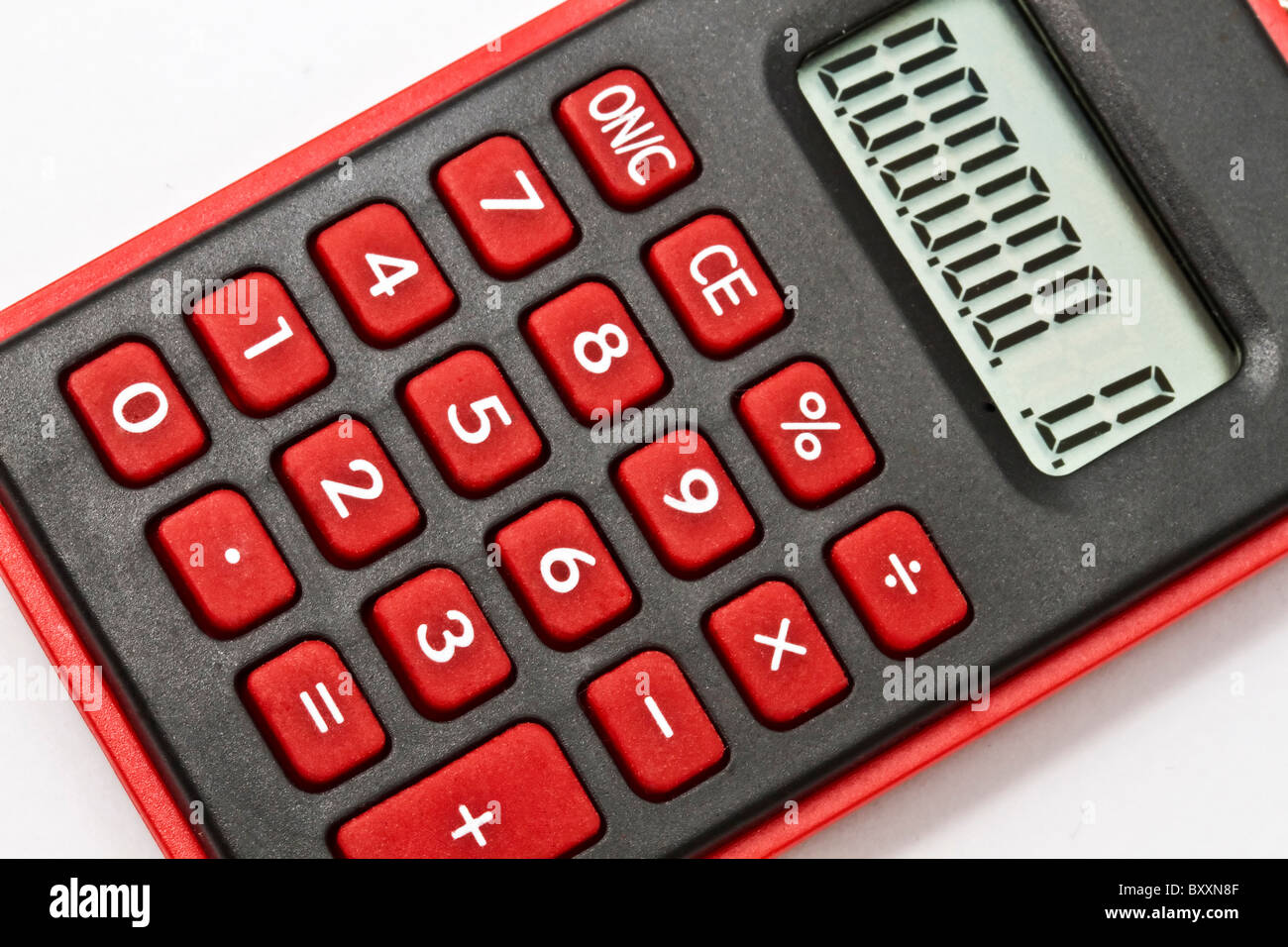 Mini red calculator isolated on white background Stock Photo - Alamy
