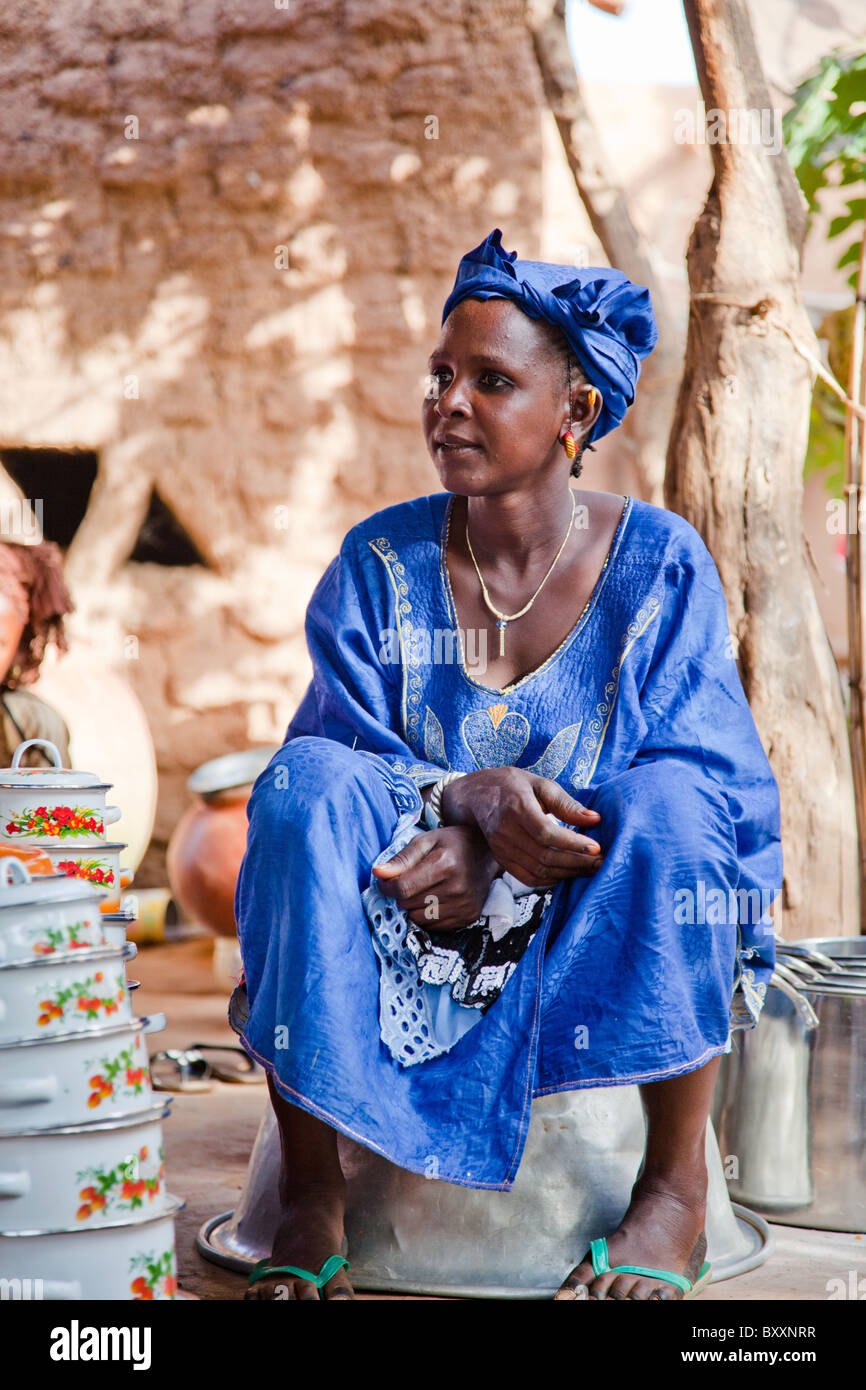 In northern Burkina Faso, a Fulani wedding has taken place. Women bring ...