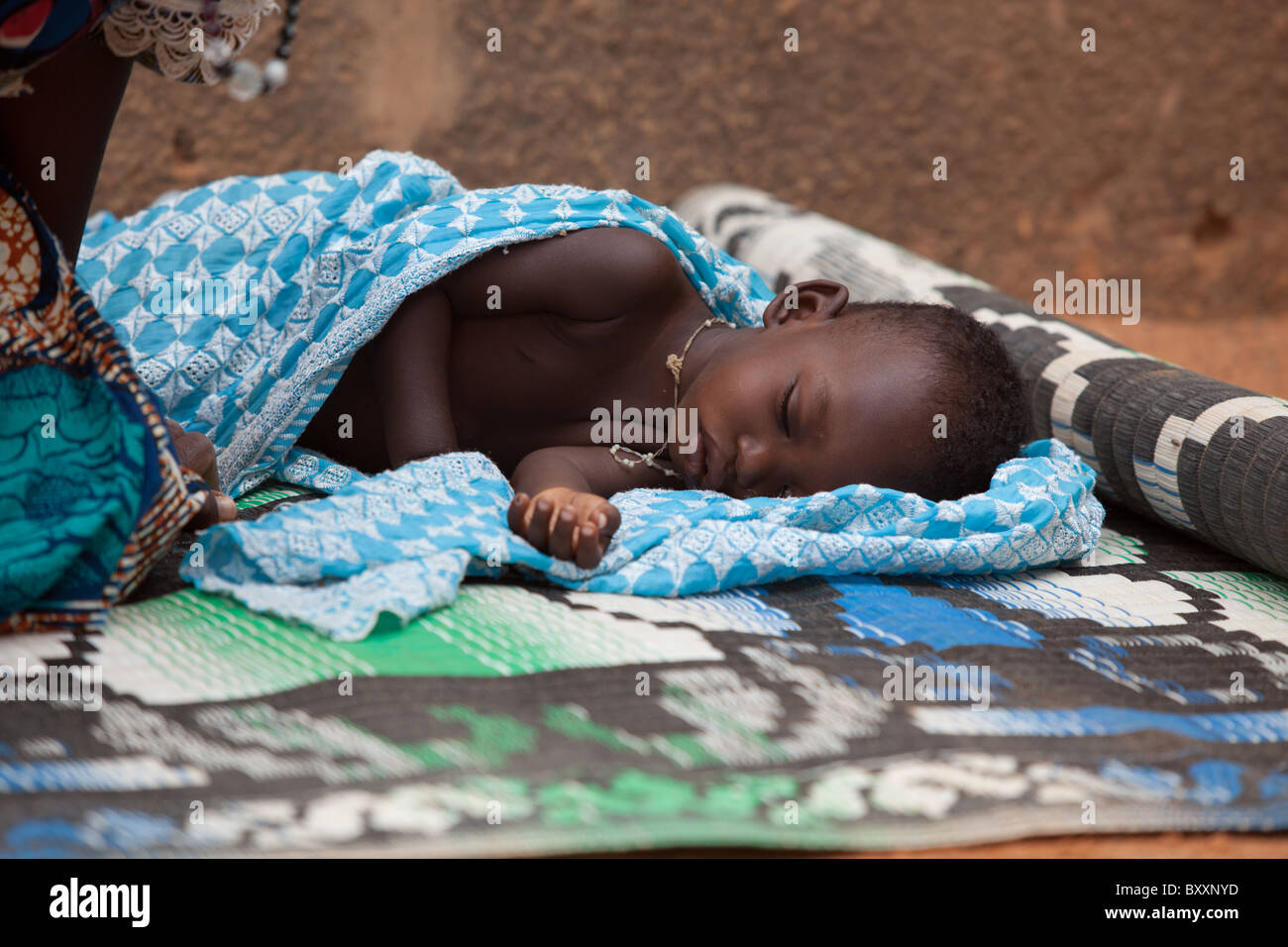 In the town of Djibo in northern Burkina Faso, a Fulani child is sick ...
