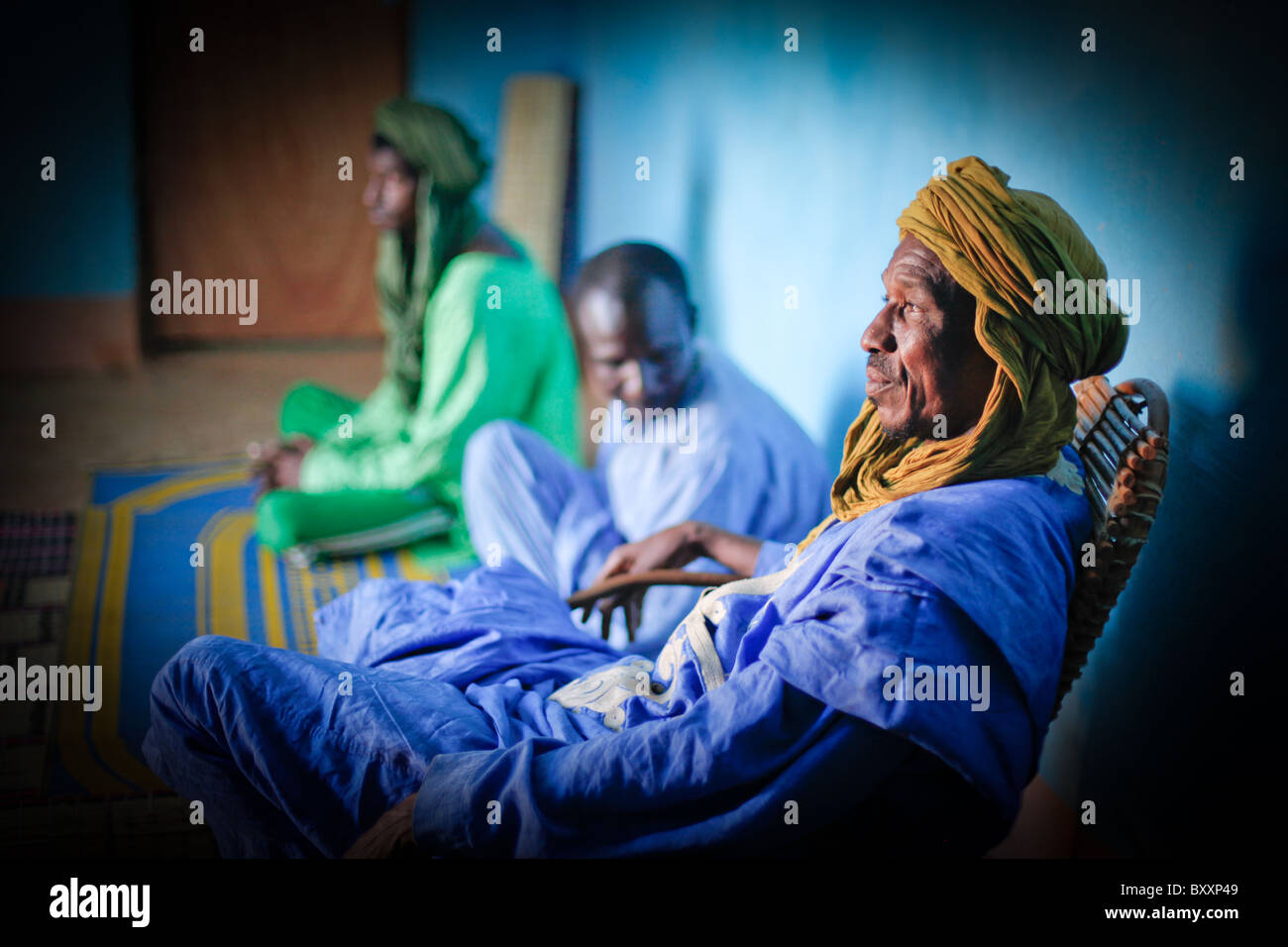 In northern Burkina Faso, a group of griots call on a Fulani family to ...