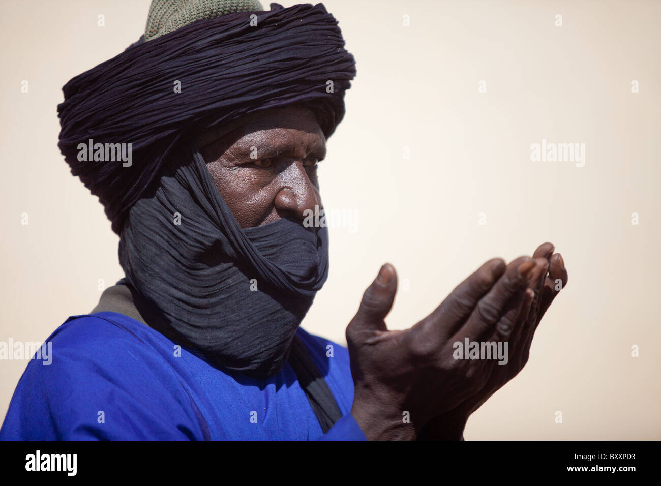 On the morning of Tabaski, a Touareg man heads to the great mosque of ...
