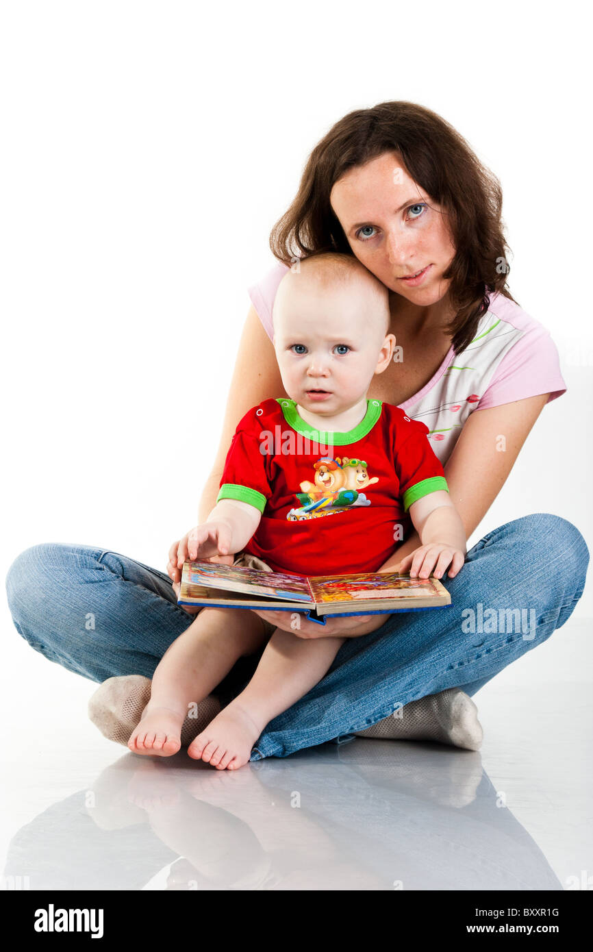Mother reading to her child isolated on white Stock Photo - Alamy