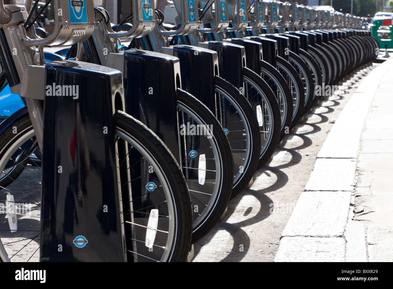 A rack of multiple rental bicycles in London, England Stock Photo - Alamy