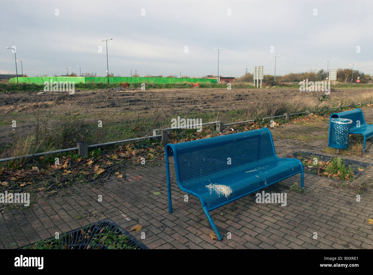 Broken bench near brownfield site UK Stock Photo - Alamy