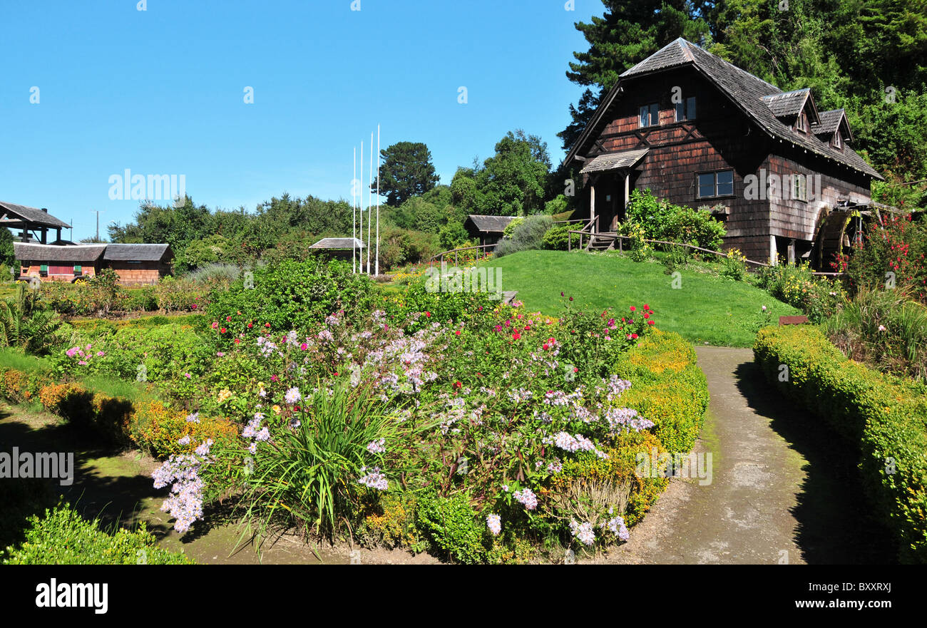 Blue sky garden view of the watermill in the grounds of the German ...