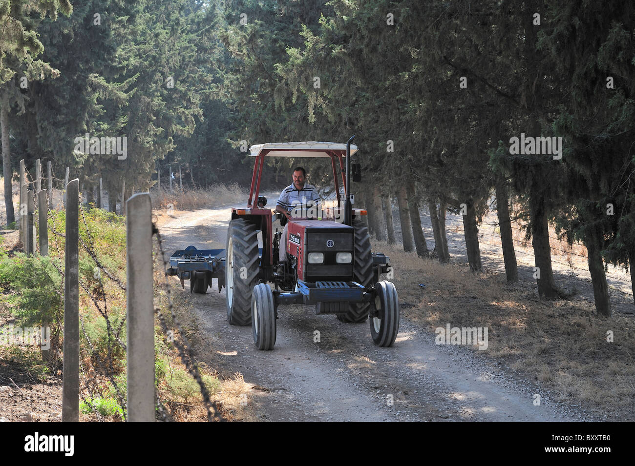 Farmer and tractor, Tell Acana (Alalakh), Turkey 100921 36589 Stock ...