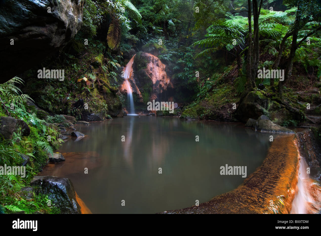 Cascade and stream from Azores Islands. It's hot volcanic water with a ...