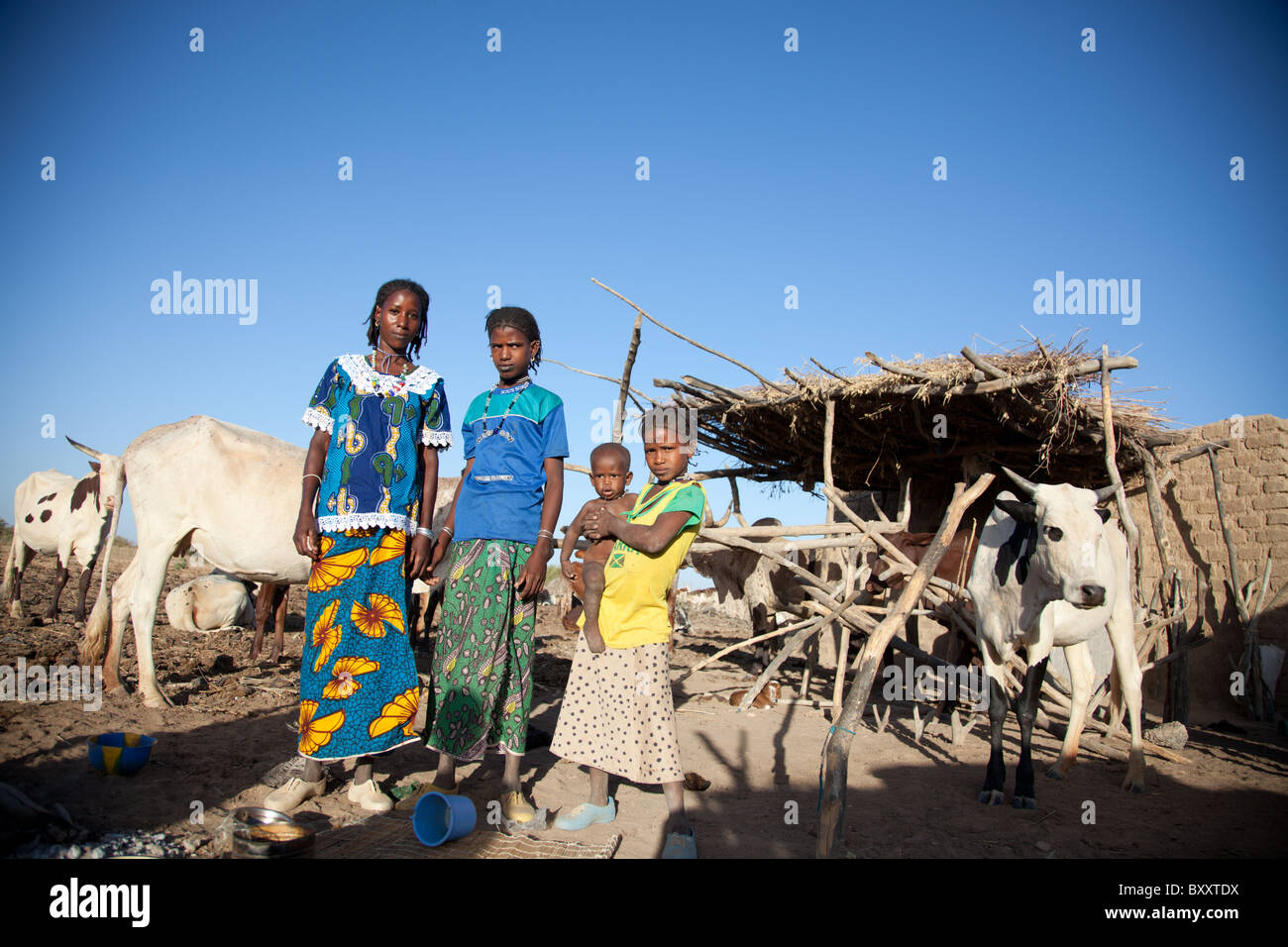 Fulani woman and children in the seasonal village of Bantagiri in ...