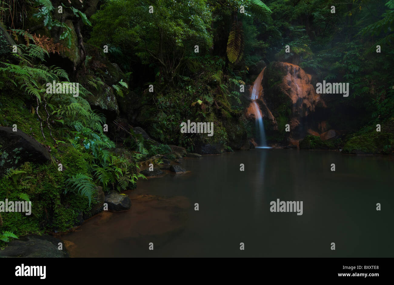 Cascade and stream from Azores Islands. It's hot volcanic water with a ...