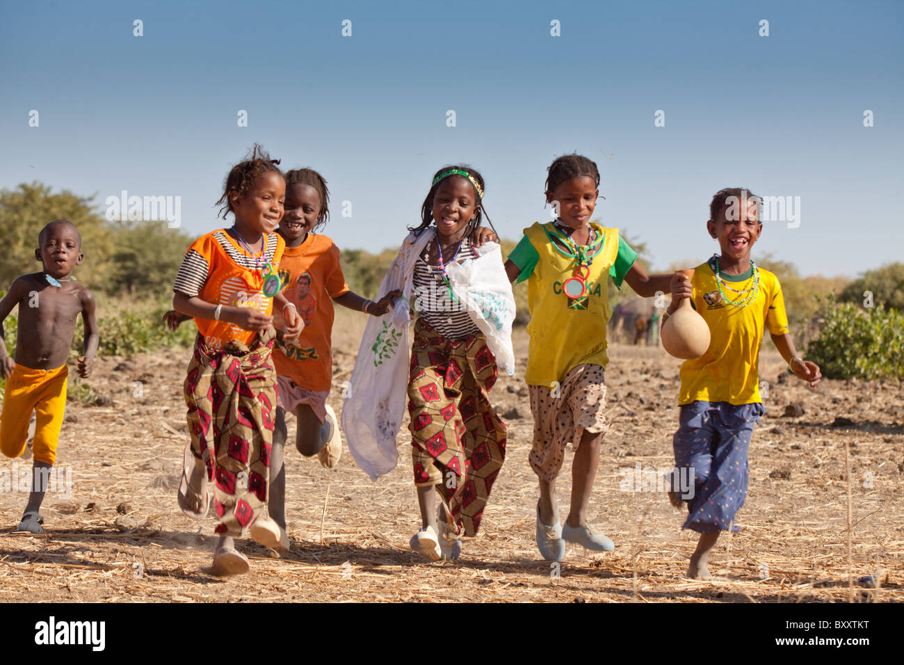 In the seasonal village of Bantagiri in northern Burkina Faso, a group ...