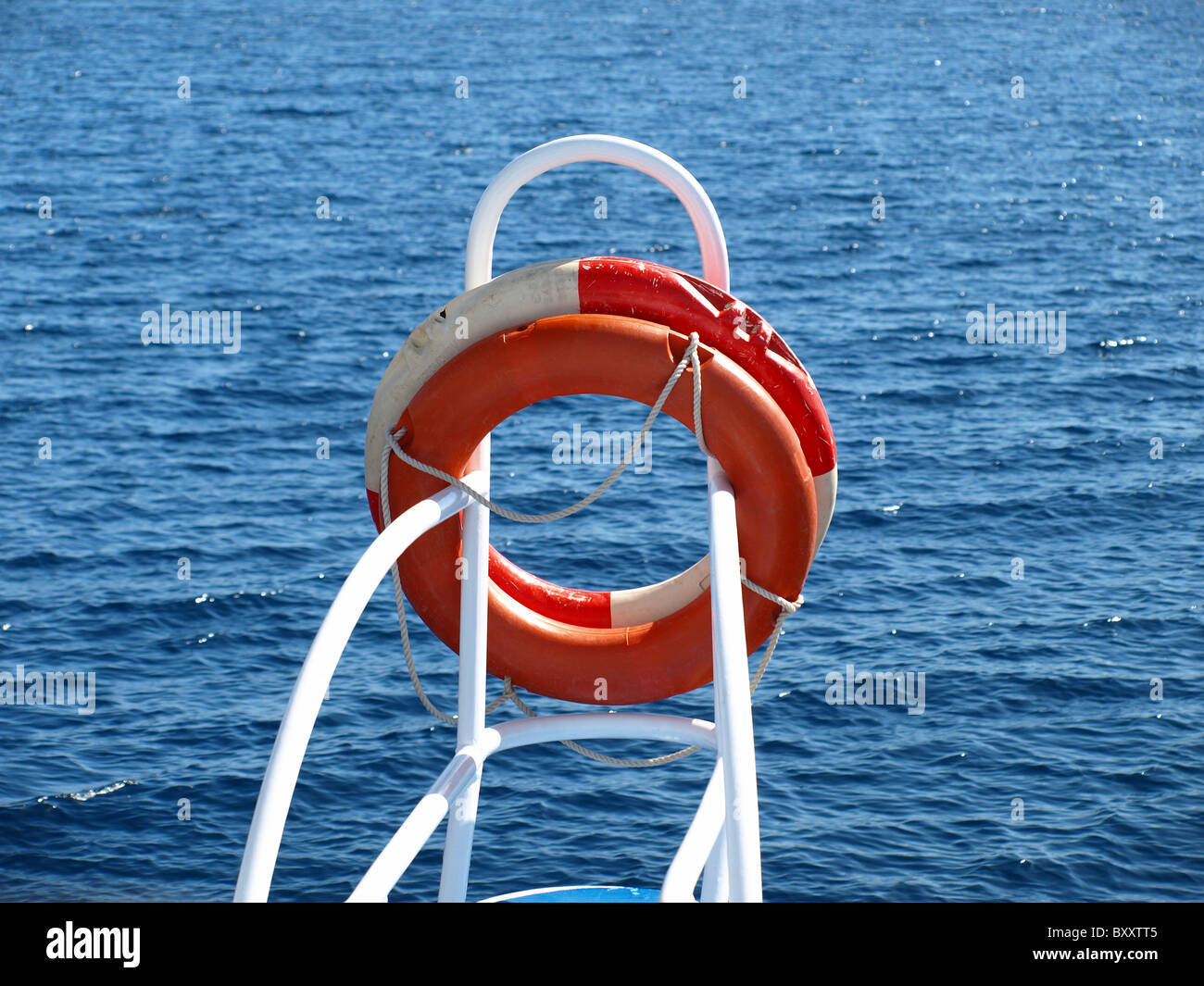 Orange safe guard ring against sea background Stock Photo - Alamy