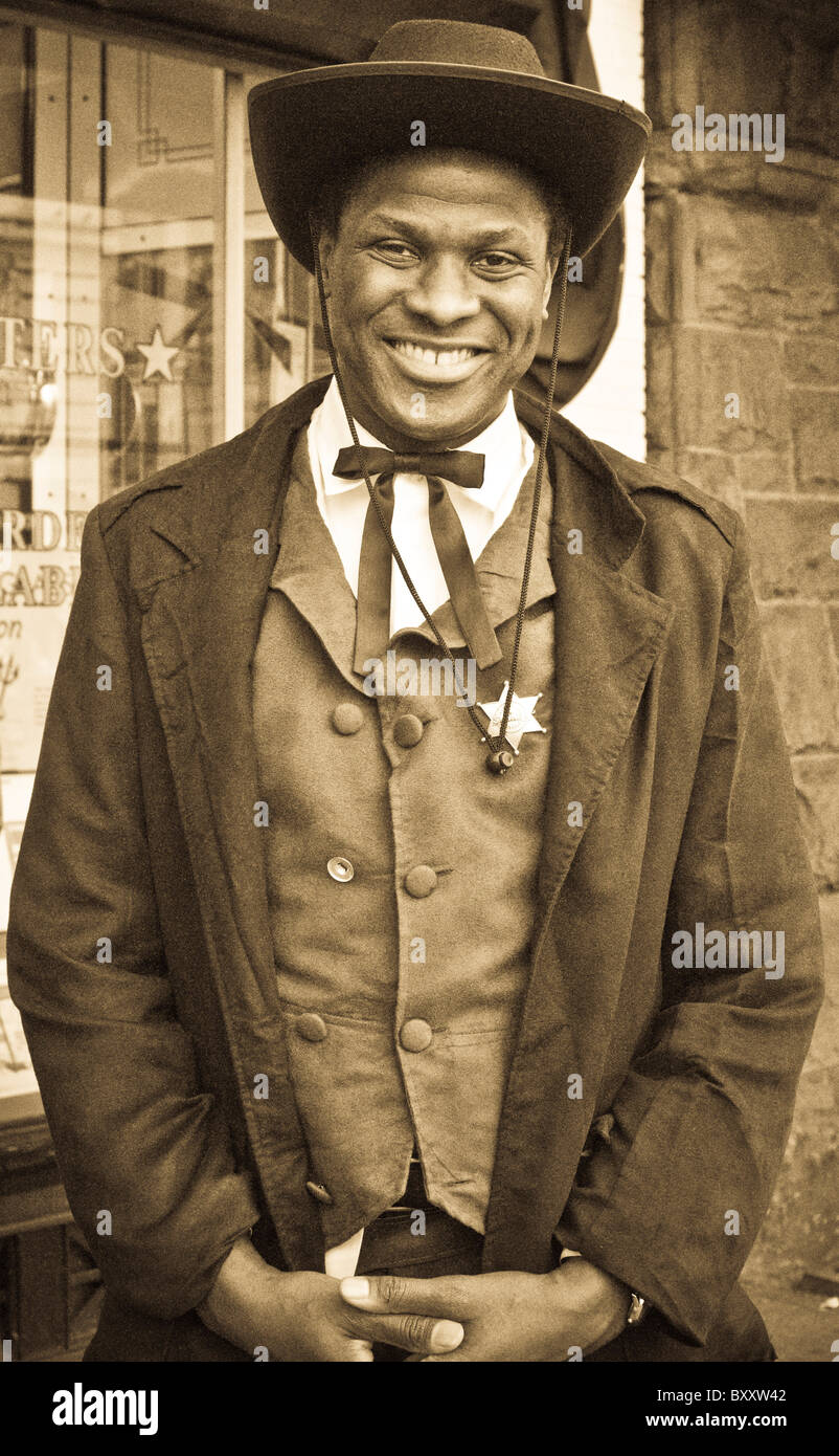 One young tall smiling African American dressed in cowboy outfit Stock ...