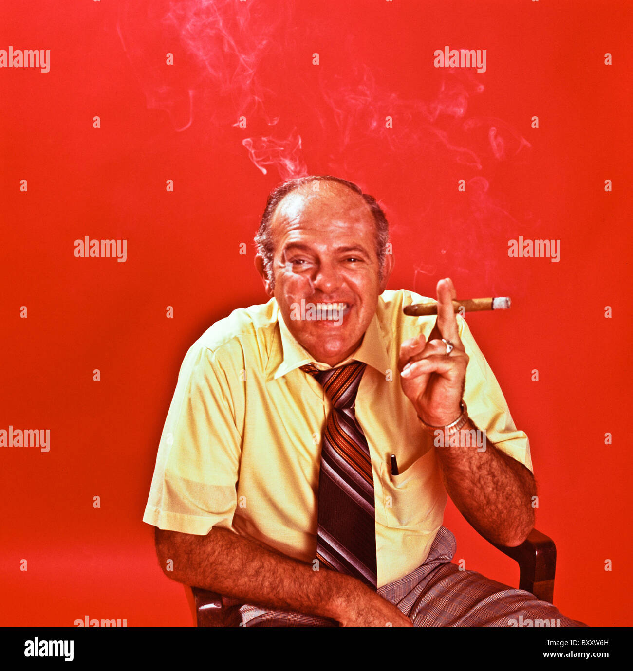 Caucasian male middle management manager supervisor relaxes in office ...