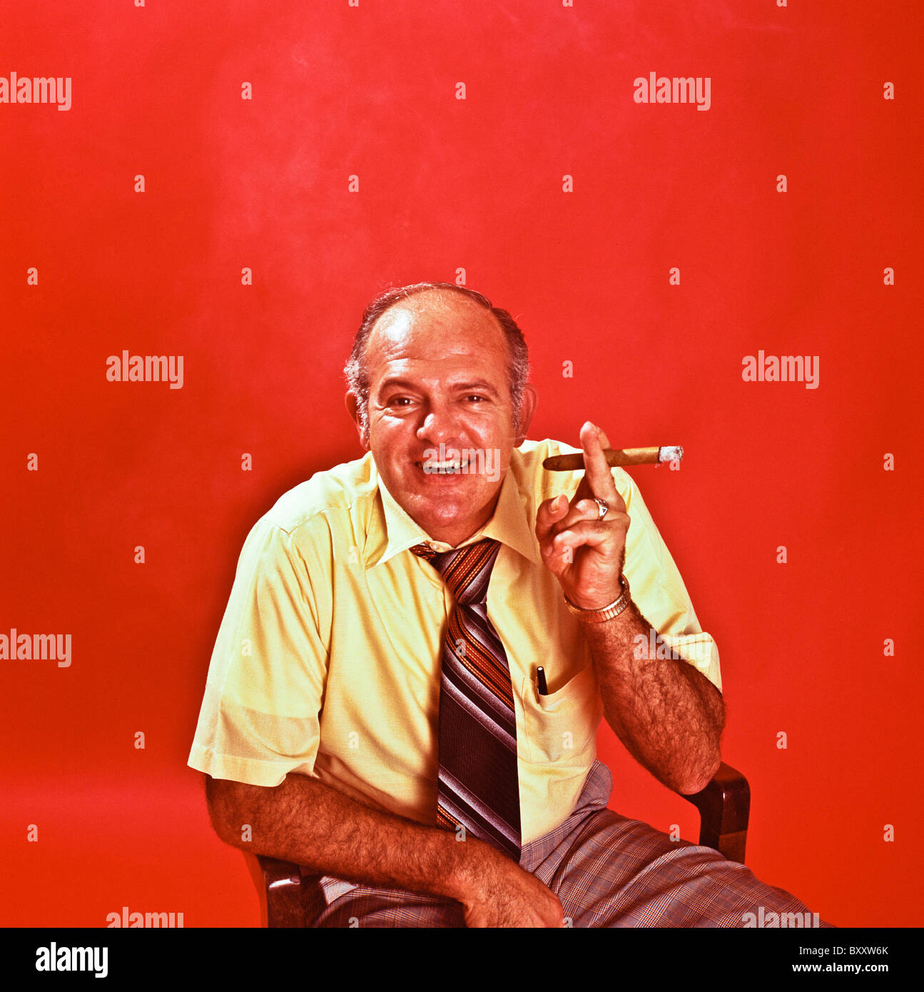 Caucasian male middle management manager supervisor relaxes in office ...