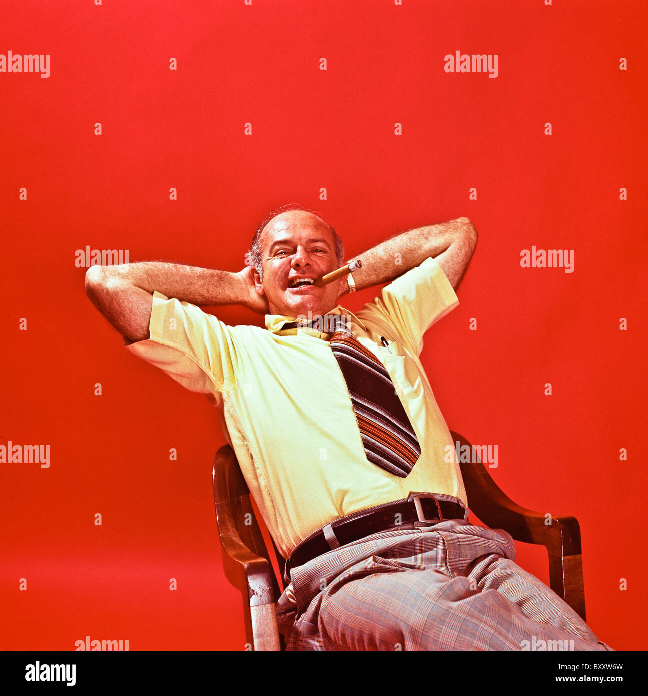 Caucasian male middle management manager supervisor relaxes in office ...