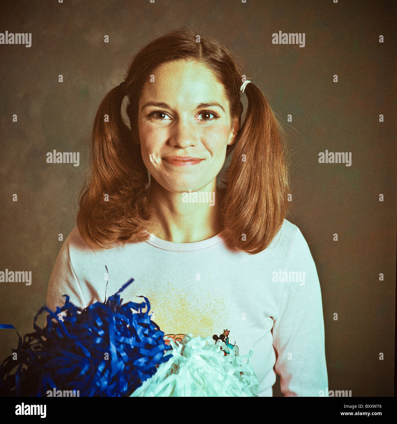 woman, female,cheerleader pom poms, pigtails Stock Photo - Alamy