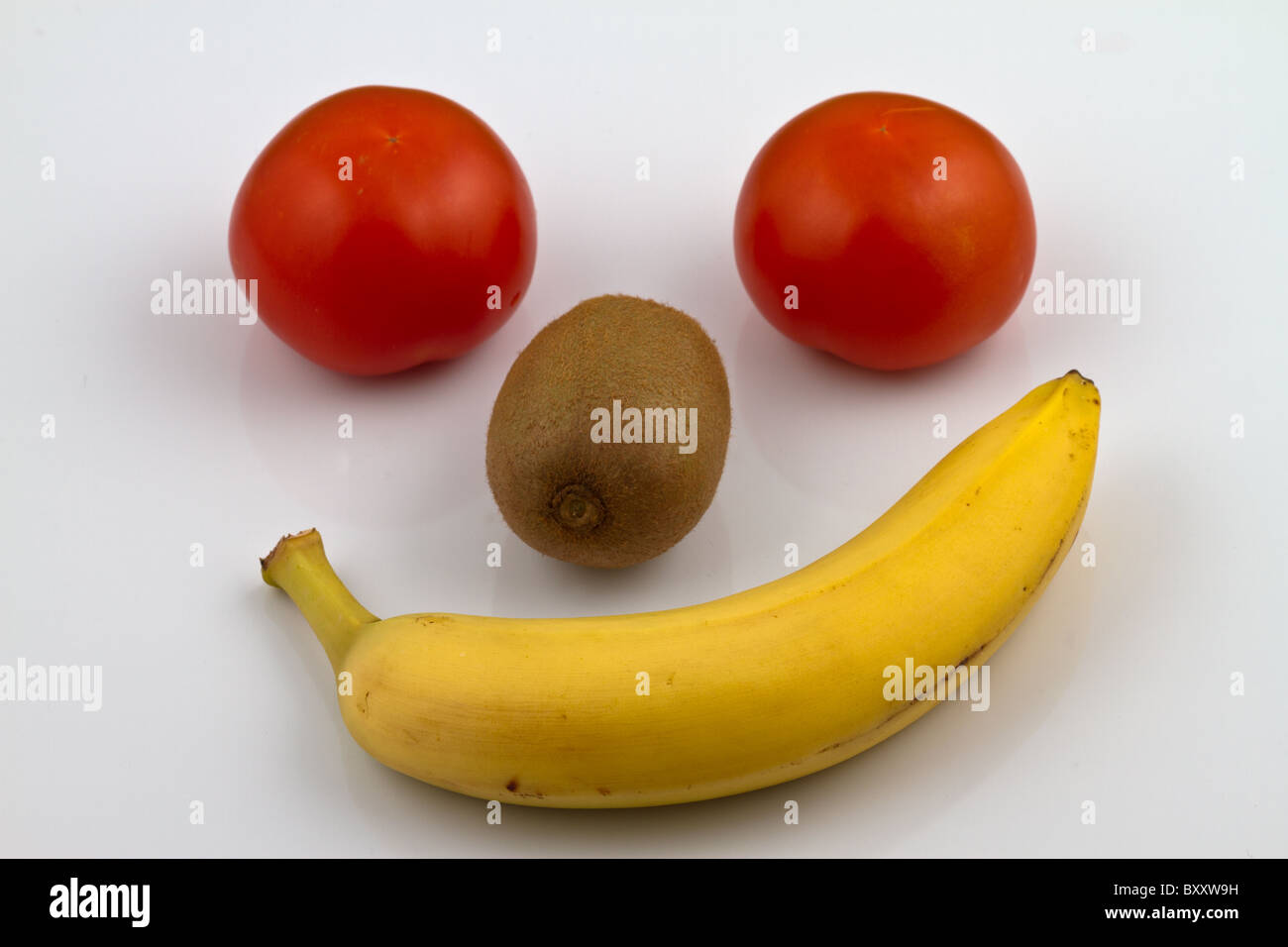 Fruits arranged as a smiling face Stock Photo - Alamy