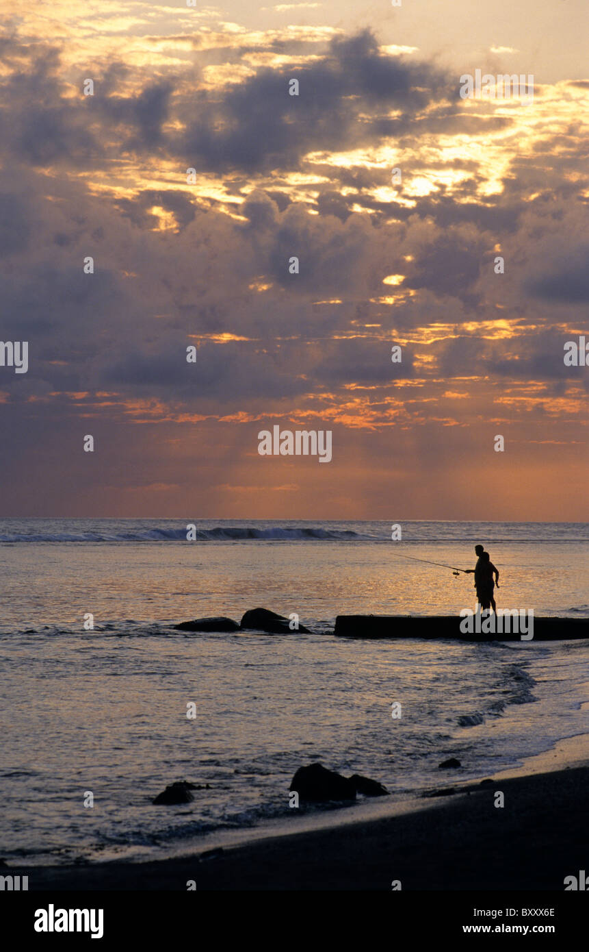 Saint Leu lagoon at end of low tide on sunset, La Reunion island ...