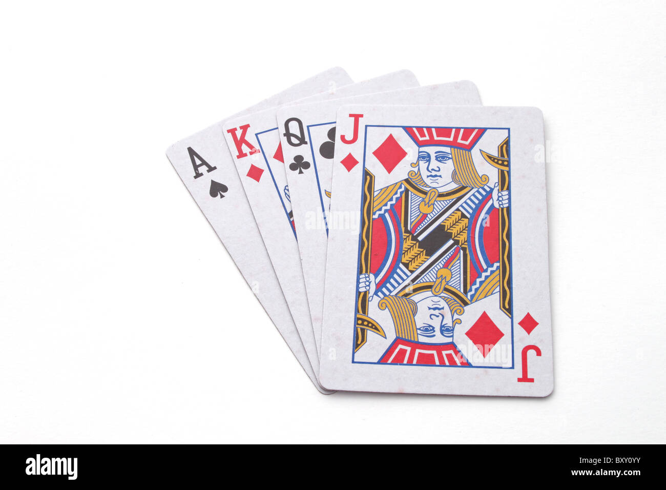 Gambling with playing cards over a white background Stock Photo - Alamy