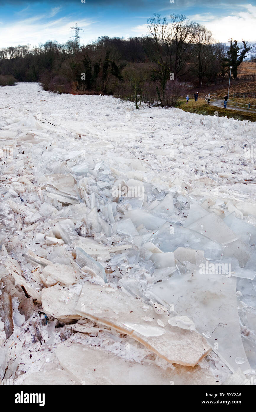 River Ayr frozen over and the ice breaking up into slabs and piling up ...