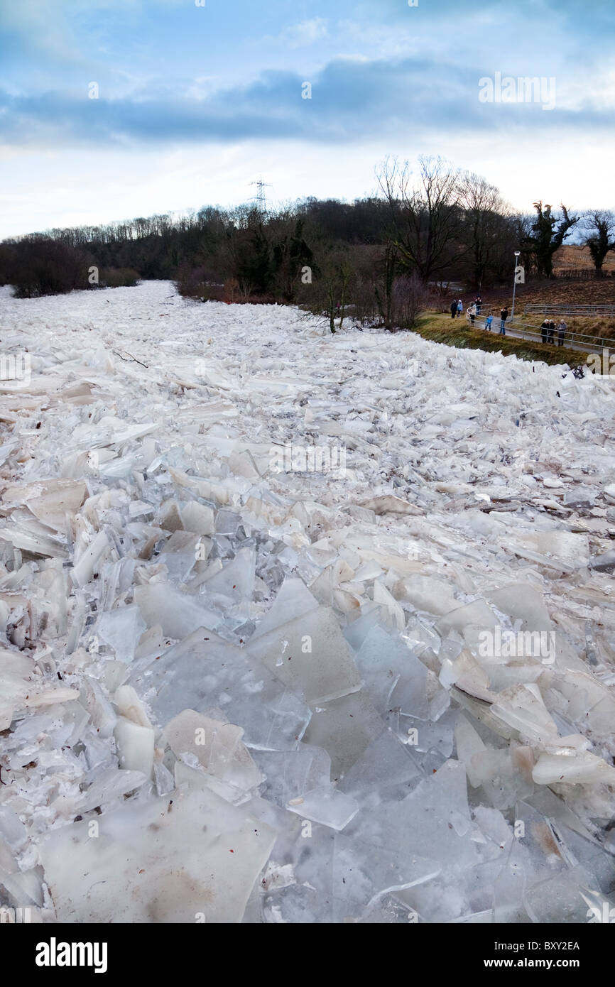River Ayr frozen over and the ice breaking up into slabs and piling up ...
