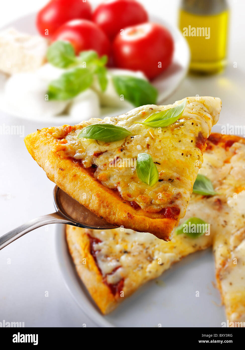 Italian cheese thin crust Pizza - margerita Stock Photo - Alamy