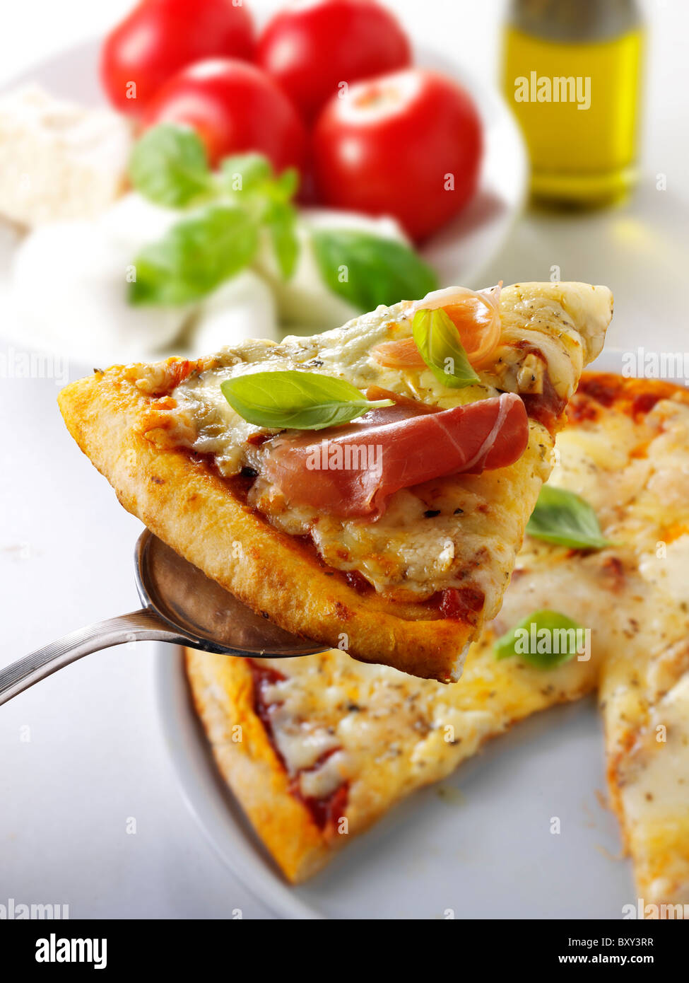 Italian prosciutto, thin crust Pizza Stock Photo - Alamy