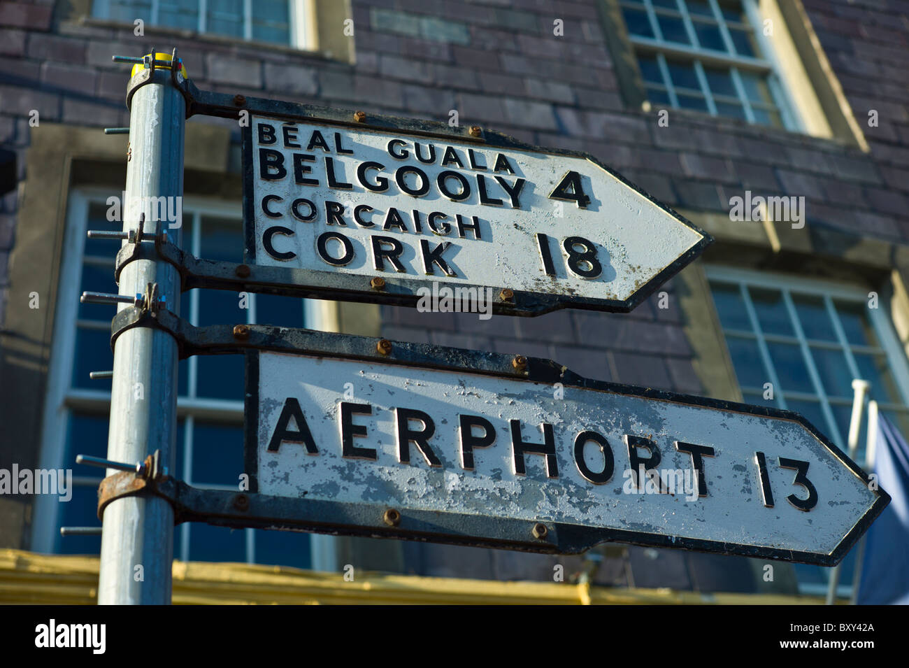Street signs in Gaelic and English point the direction to Cork, the ...