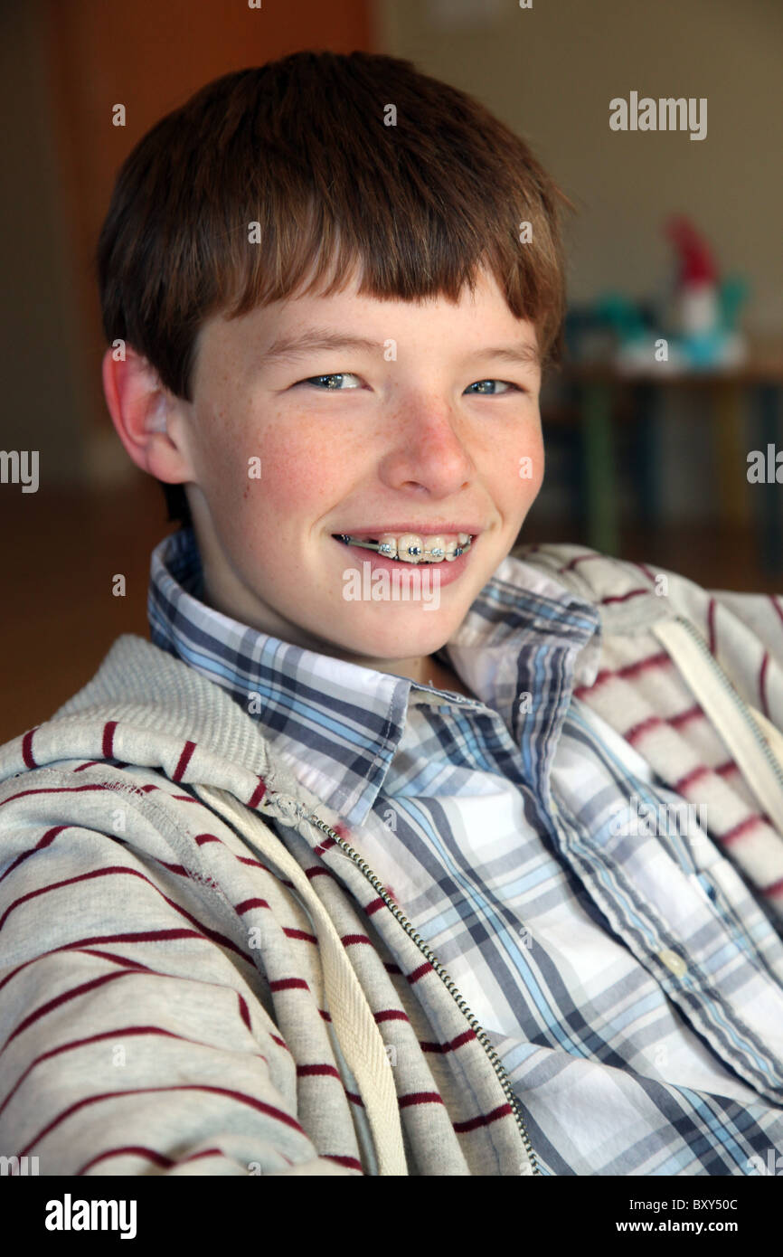 Freckled face boy smiles for the camera Stock Photo - Alamy