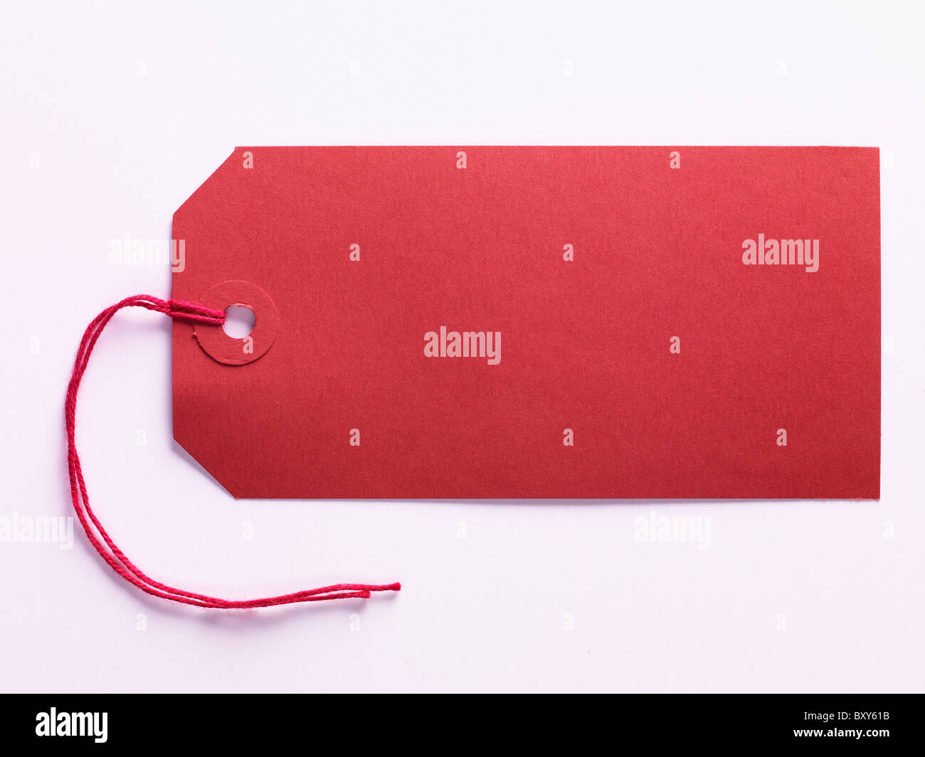 red luggage tag with red string Stock Photo - Alamy red luggage tag with red string Stock Photo - Alamy