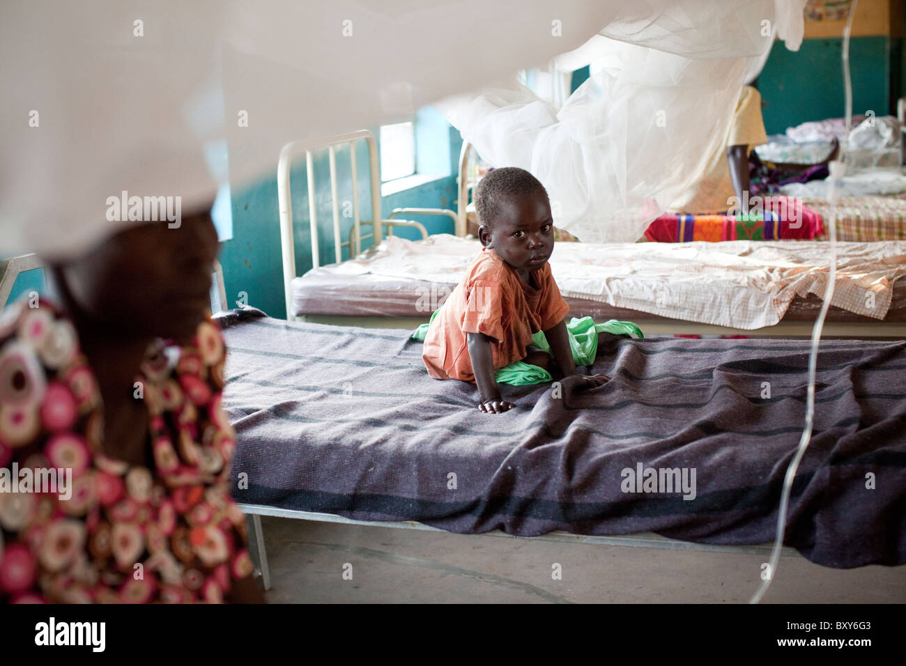 Women and children rest in the maternity ward at Amuria Health Centre ...