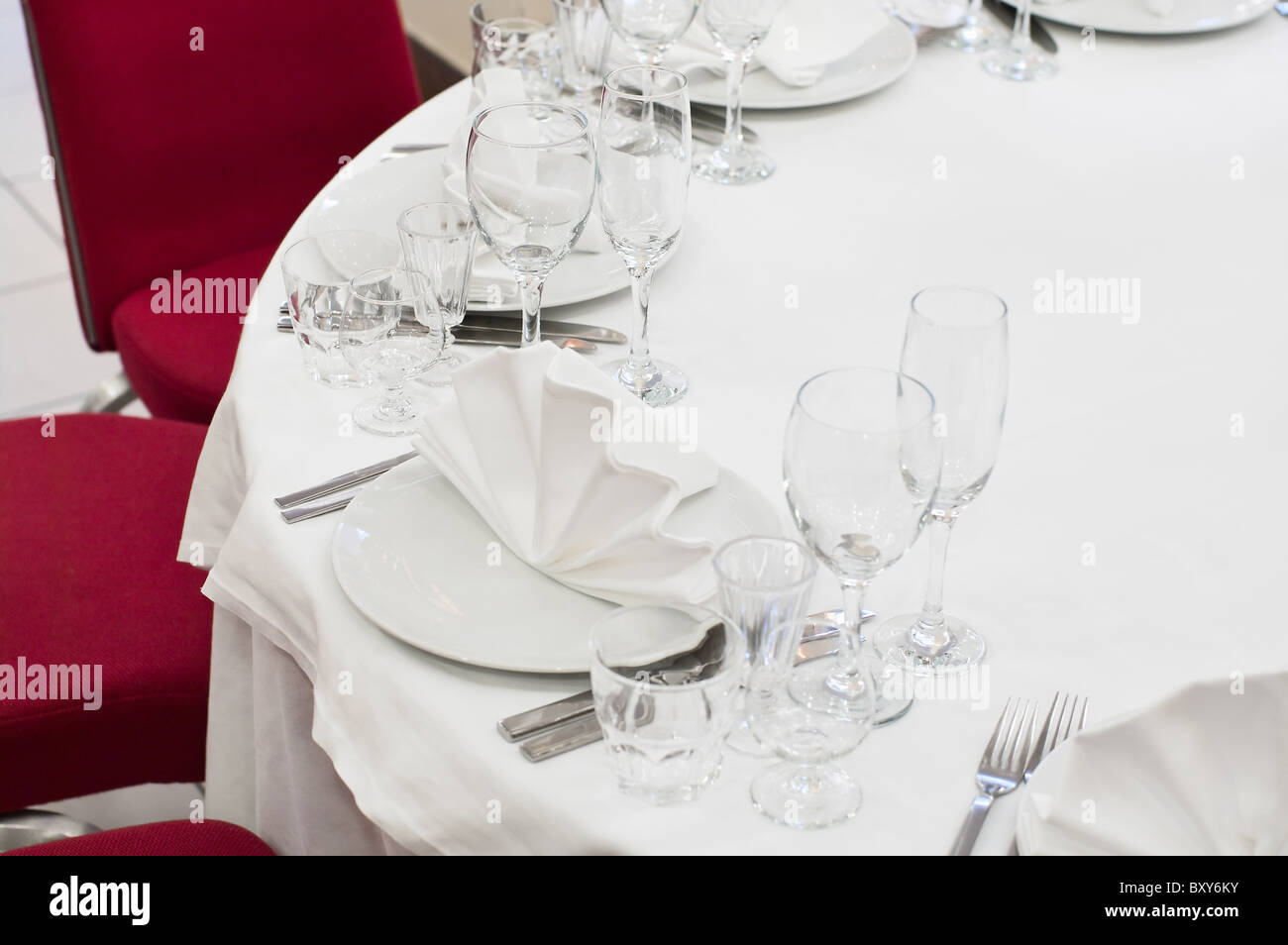 Elegant banquet and dinner tables prepared for a holiday or a party ...