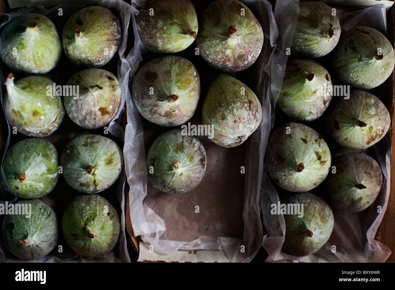 Light green dusky figs for sale at a greengrocer's Stock Photo - Alamy